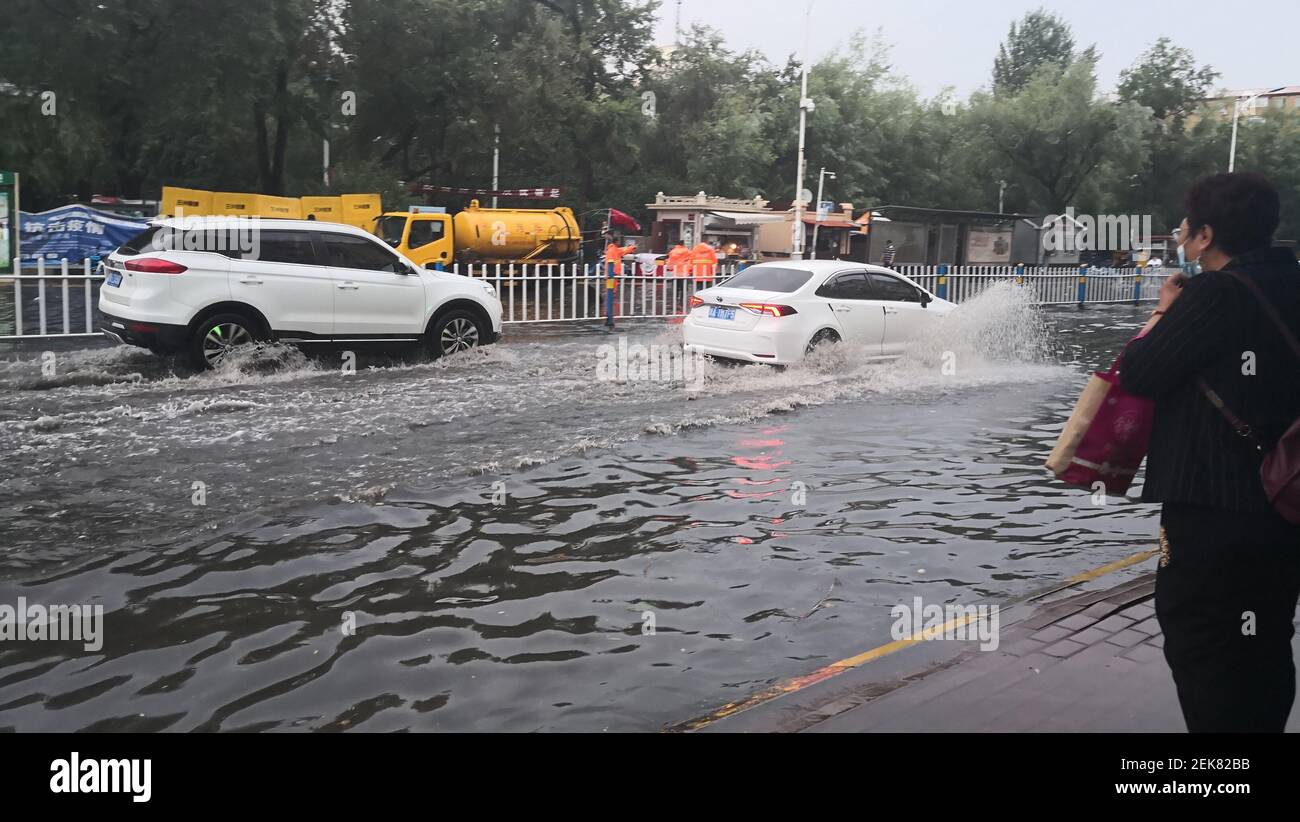 HARBIN, CHINA - JULY 3, 2020 - Trees are blown down and roads become ...