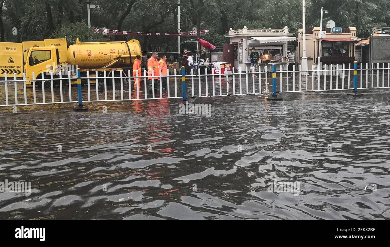 HARBIN, CHINA - JULY 3, 2020 - Trees are blown down and roads become ...