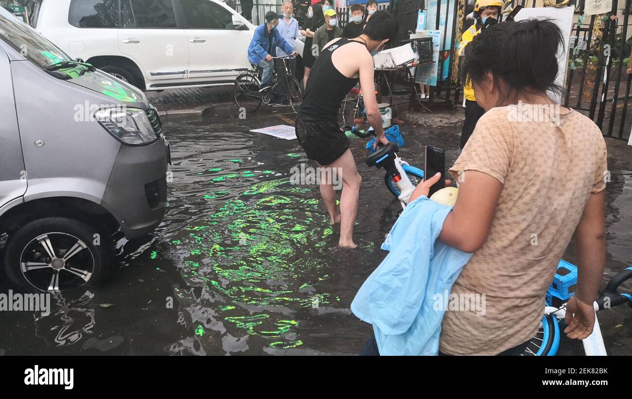 HARBIN, CHINA - JULY 3, 2020 - Trees are blown down and roads become ...