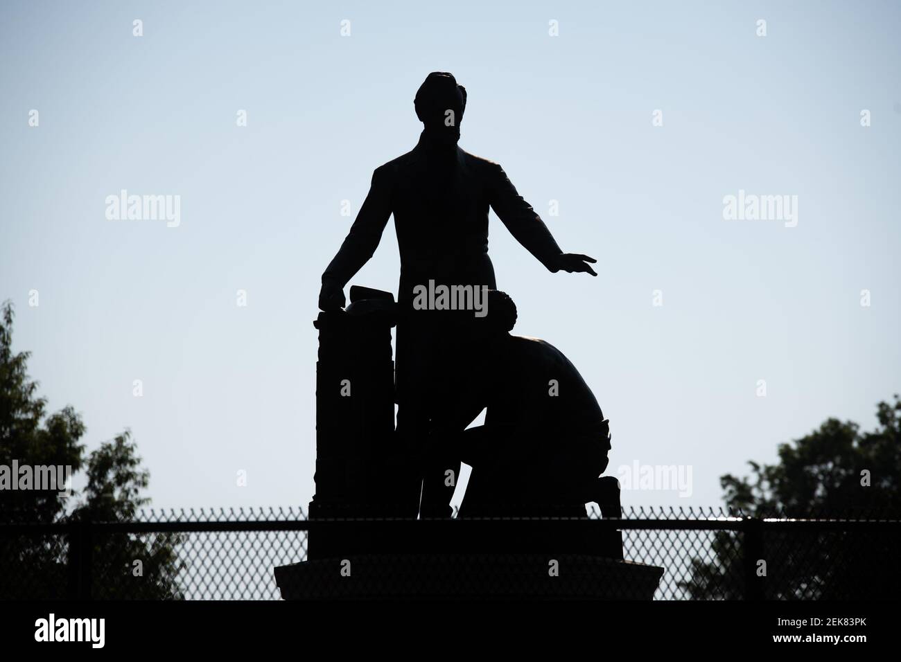 A silhouette view of the controversial Emancipation Memorial by Thomas ...