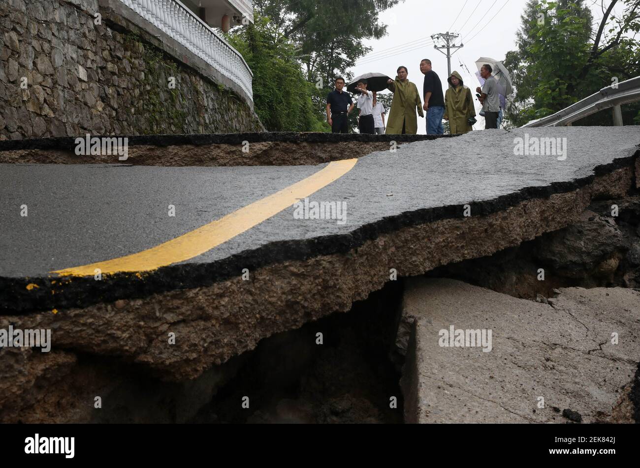 CHONGQING, CHINA - JULY 4, 2020 - Road collapse caused by rainstorm ...