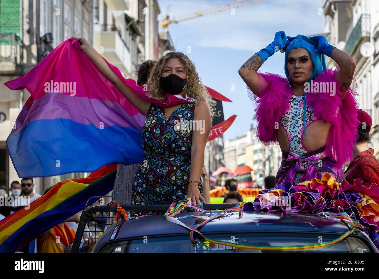 Participants pose for a photo during the parade day. A group of people ...