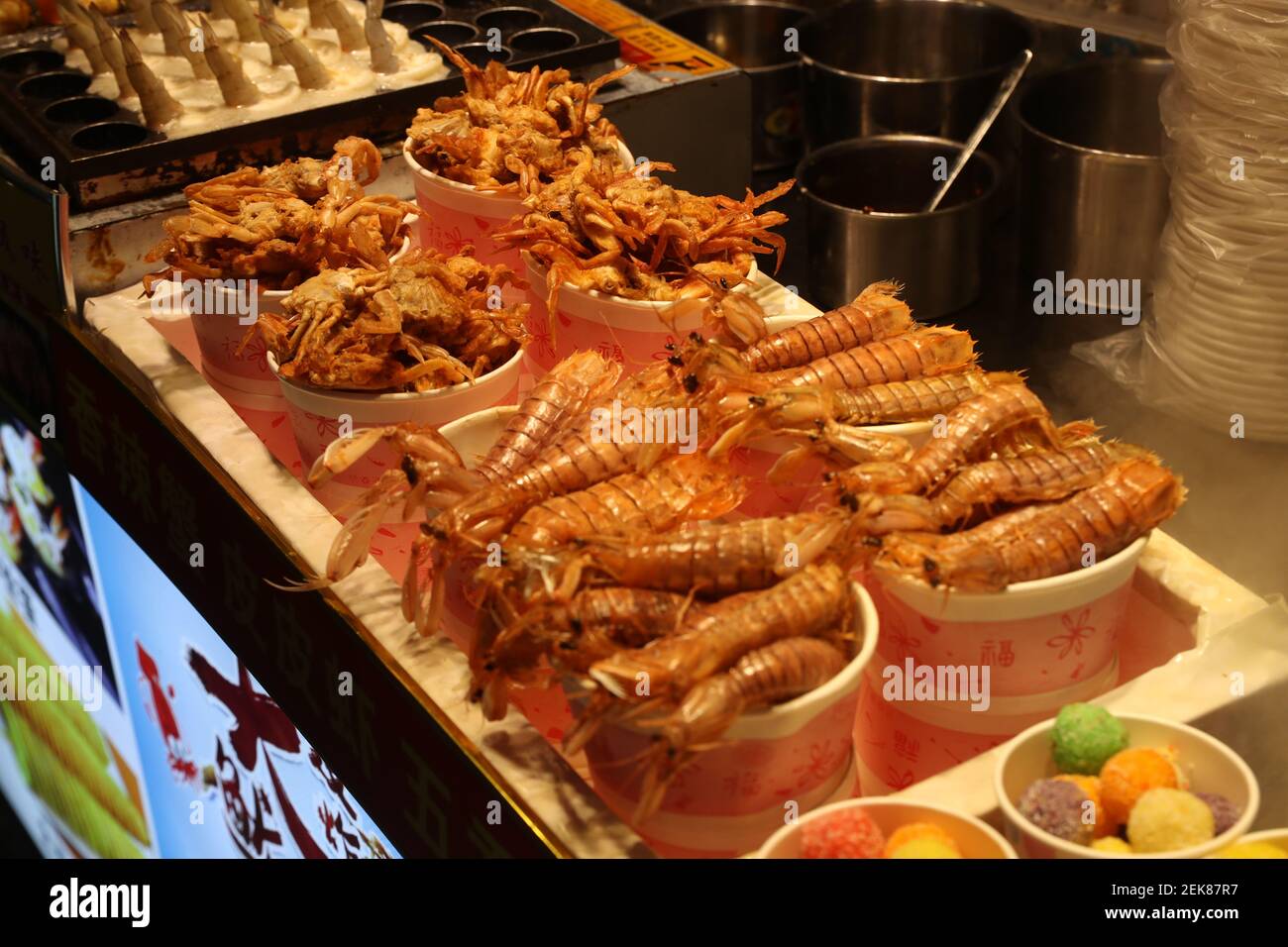 Tourists crowd at Zengcuoan, a local tourist spot famous for its night ...