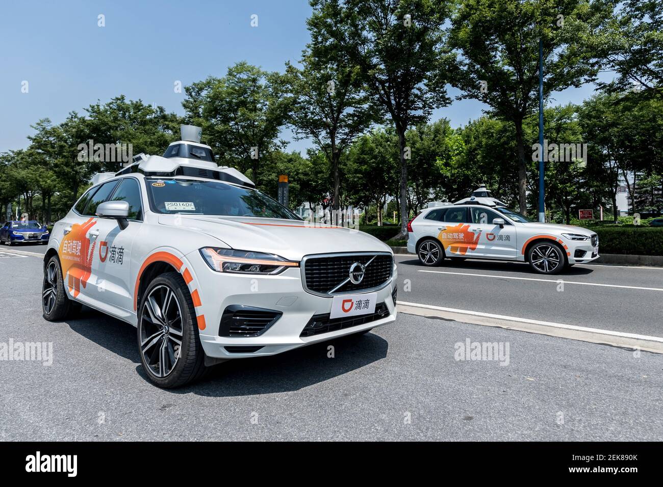 Self-driving cars developed by Didi, a Chinese company providing app ...