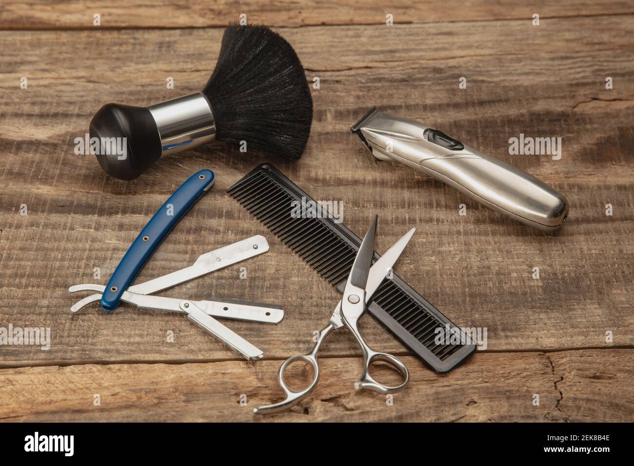 Barber shop equipment set isolated on wooden table background. Close up ...