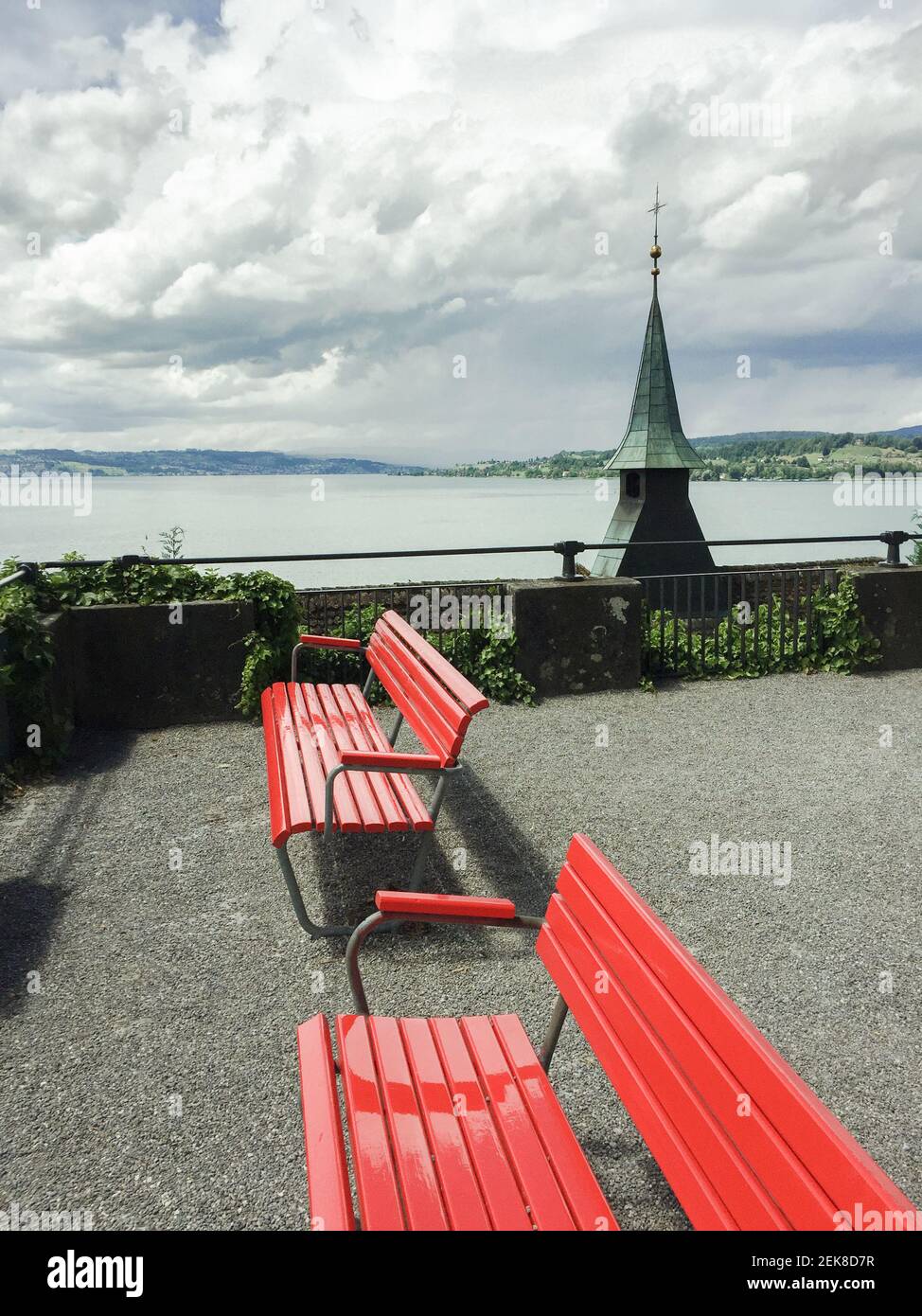 View of red benches for rest and lake Geneva. Switzerland Stock Photo ...