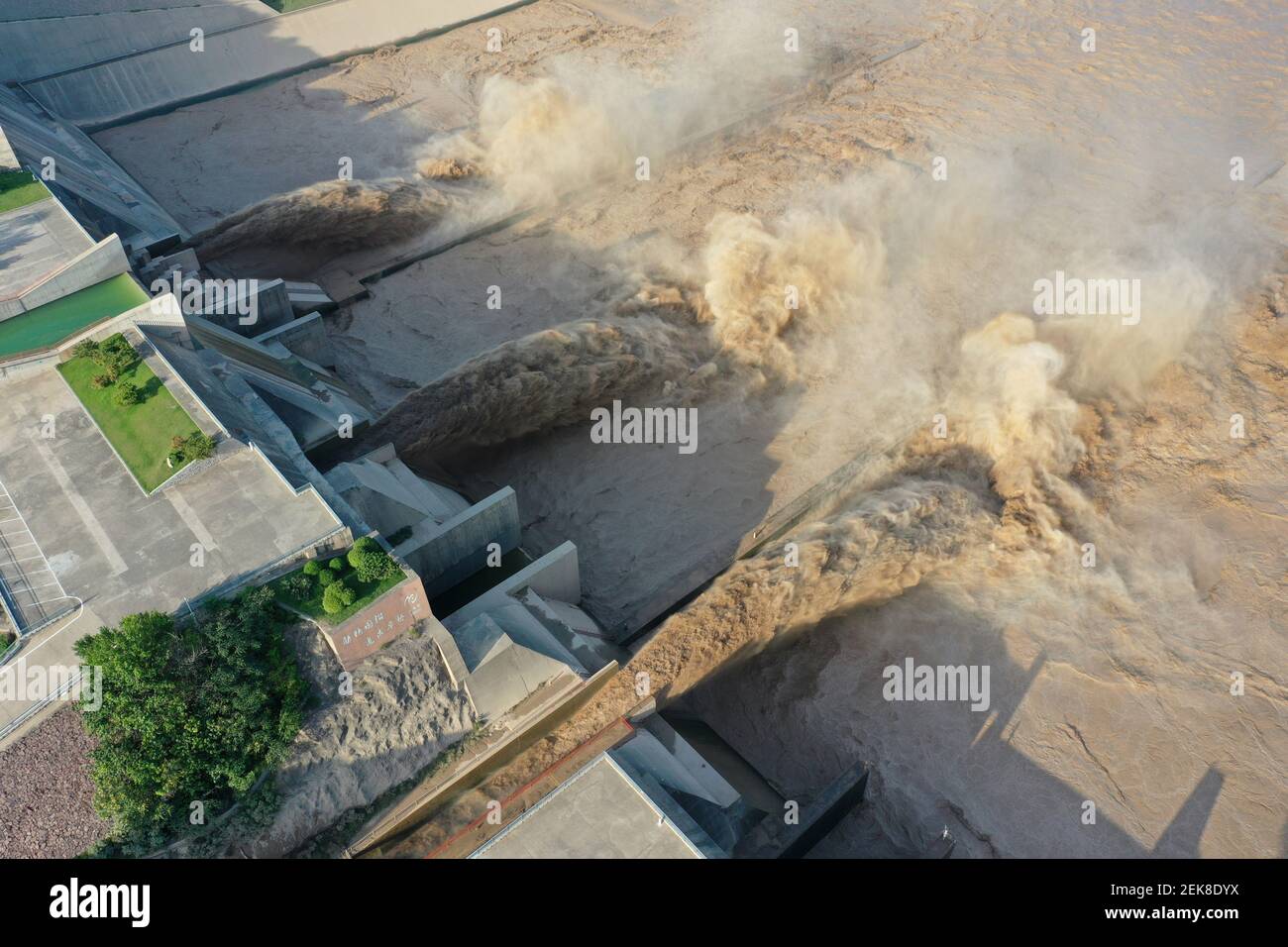 Aerial view of Xiaolangdi Dam discharging flood and sand after days of ...
