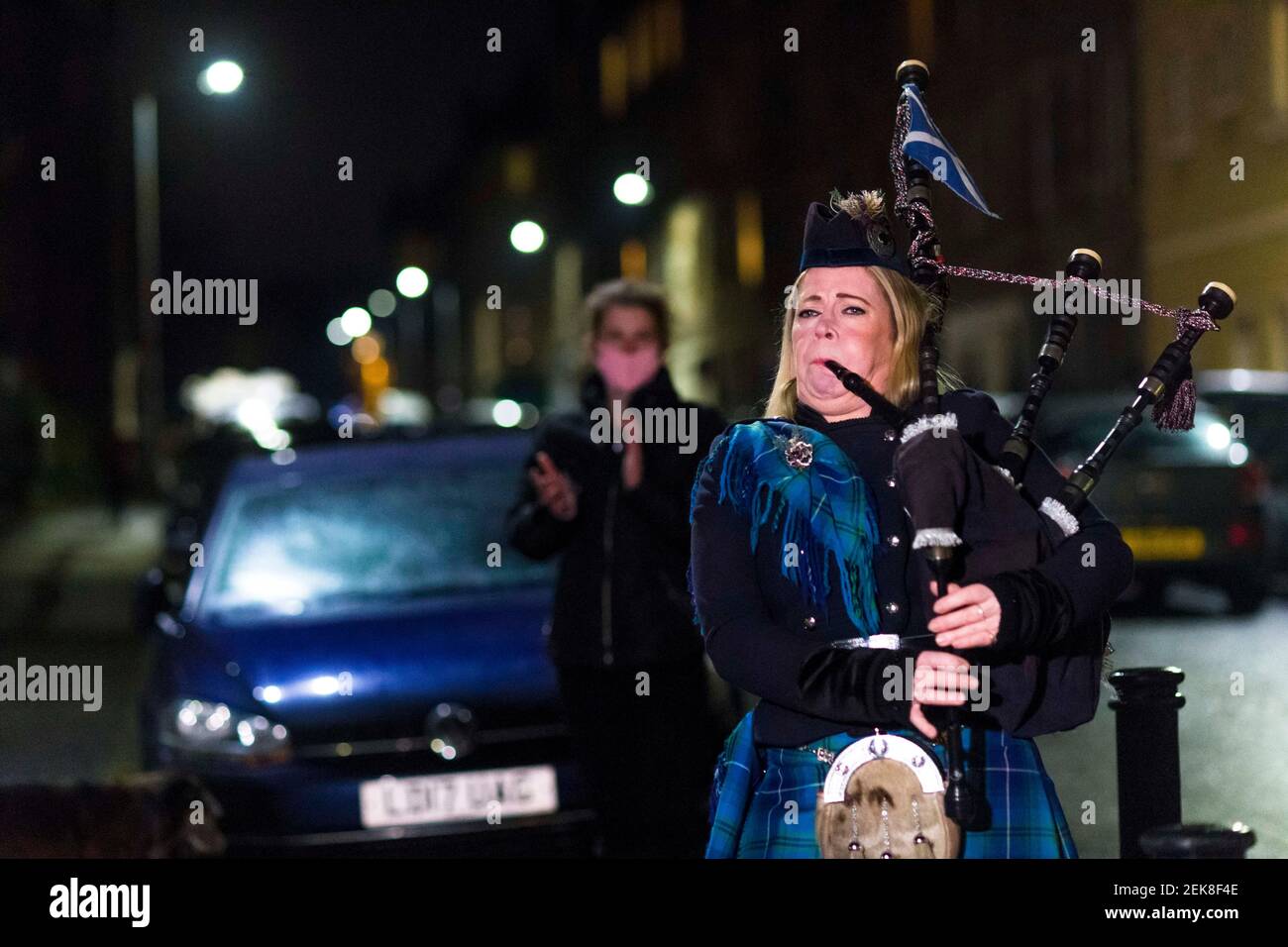 Piper Louise Marshall performs on her bagpipes, and neighbors on the ...