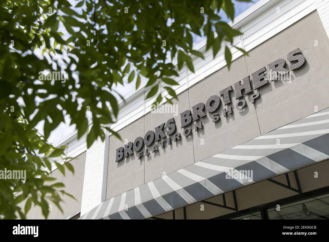 A logo sign outside of a Brooks Brothers Flatiron Shop retail store ...
