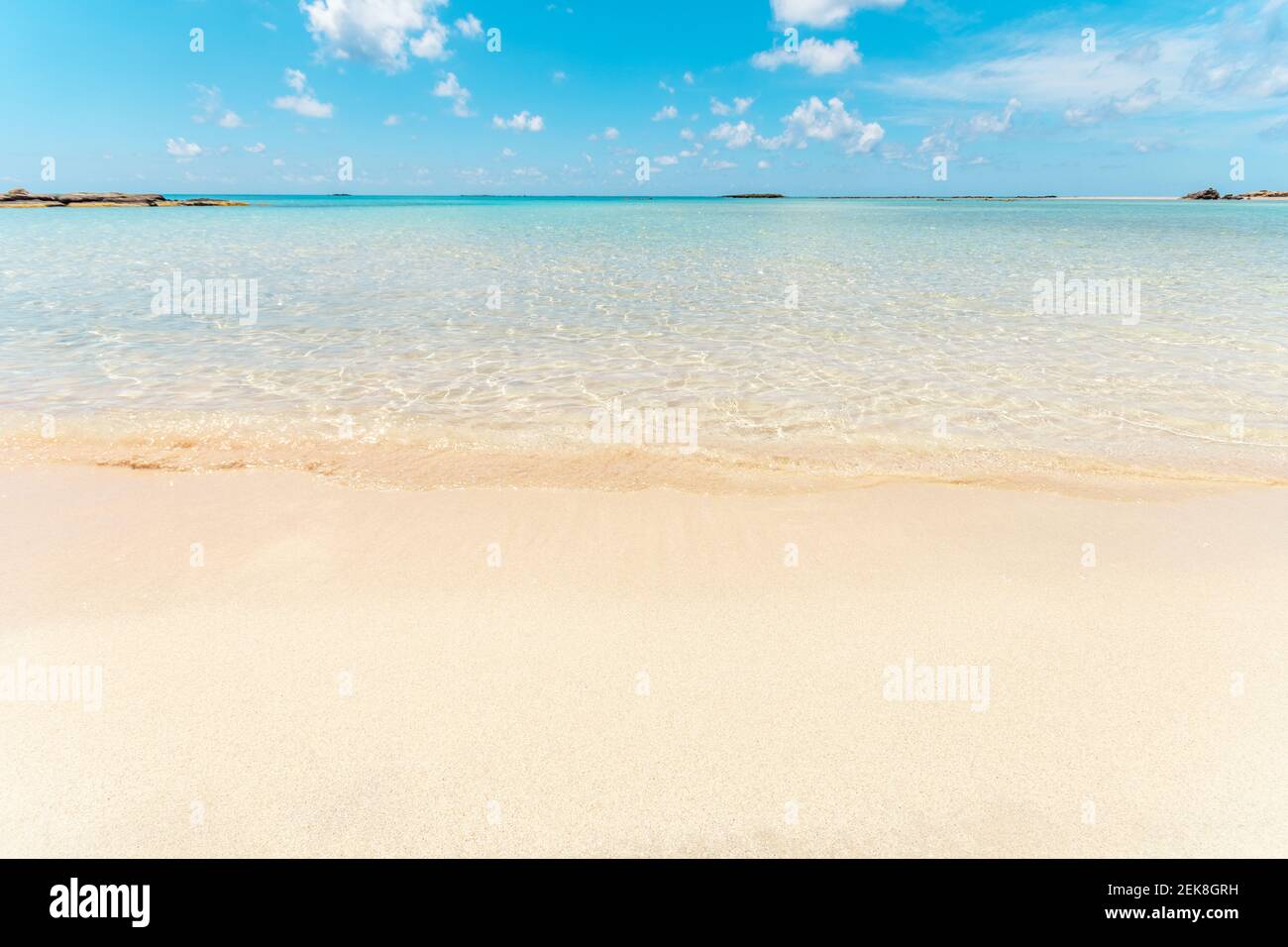 Soft blue sea wave on clean sandy beach. Holiday vacation and travel ...