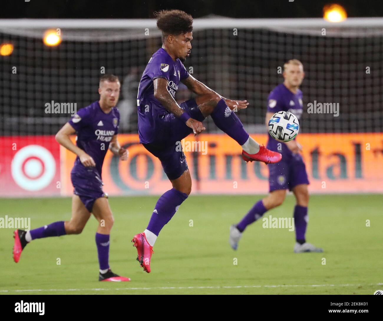 Orlando City's Junior Urso leaps to kick during action against Inter ...