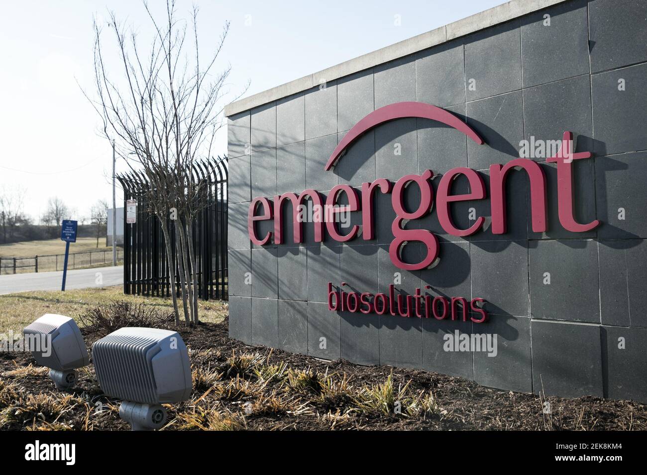 A logo sign outside of a facility occupied by Emergent BioSolutions in ...