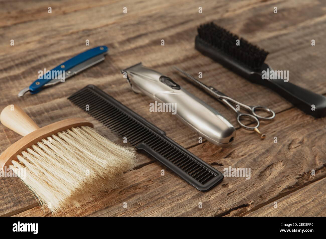 Barber shop equipment set isolated on wooden table background. Close up ...