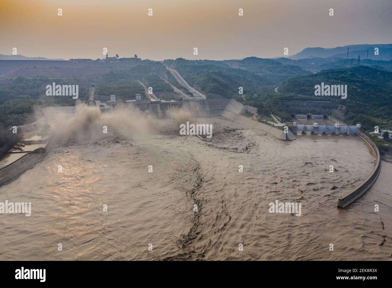 Aerial view of Xiaolangdi Dam discharging flood and sand after days of ...