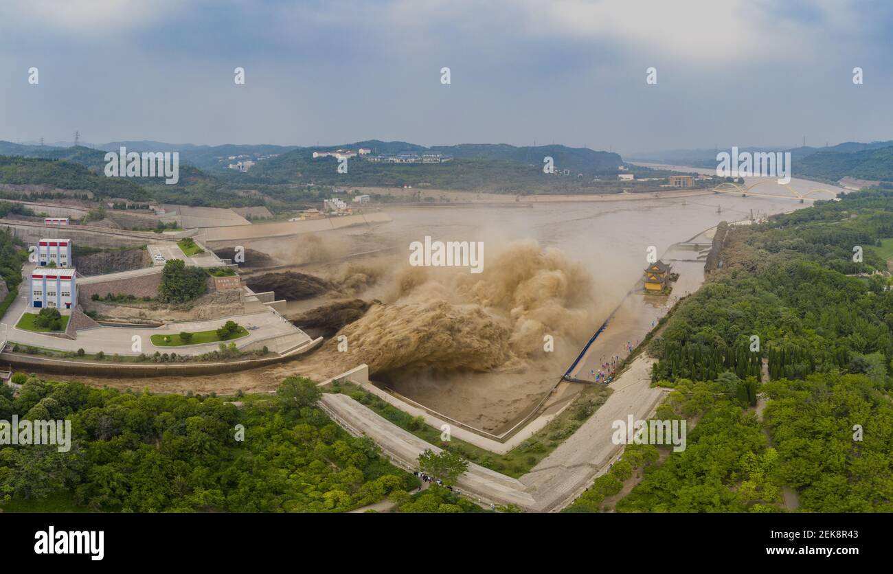 Aerial view of Xiaolangdi Dam discharging flood and sand after days of ...