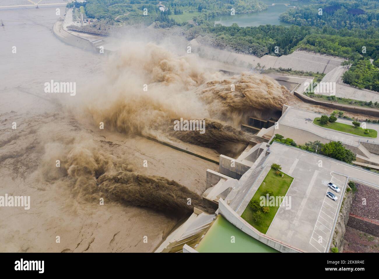 Aerial view of Xiaolangdi Dam discharging flood and sand after days of ...
