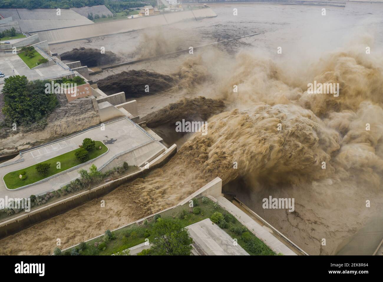 Aerial view of Xiaolangdi Dam discharging flood and sand after days of ...