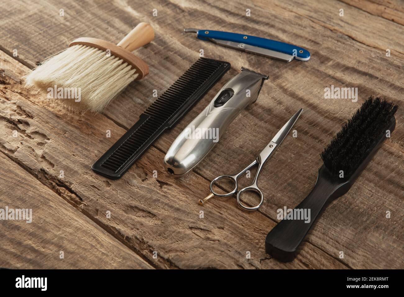 Barber shop equipment set isolated on wooden table background. Close up ...