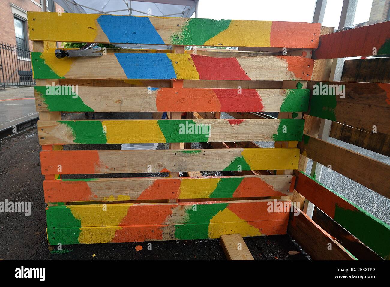 Built and decorated wooden proctective barriers for a restaurant in the ...