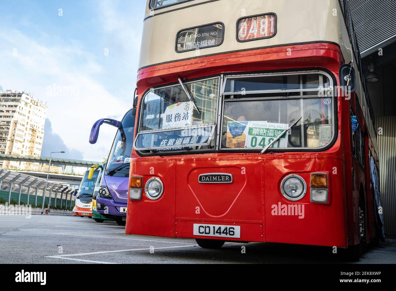 An old double-decker bus remodelled as a polling station. In ...