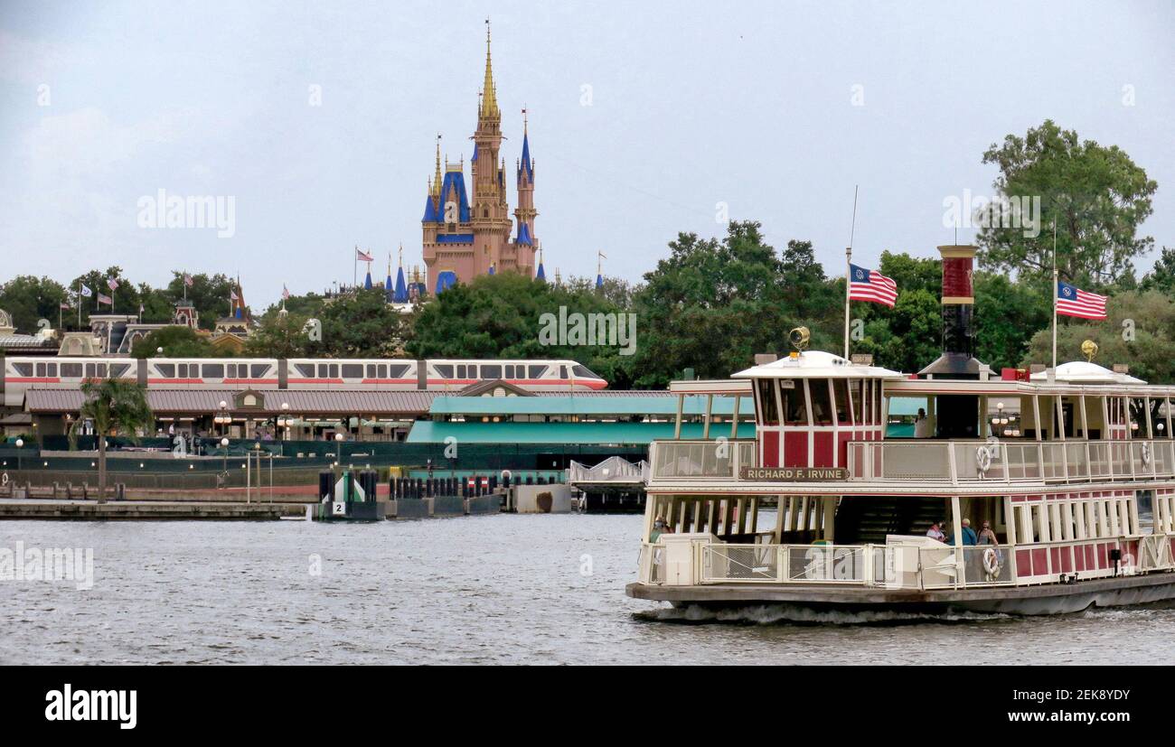 Ferry boats and monorails operate during the official re-opening day of ...