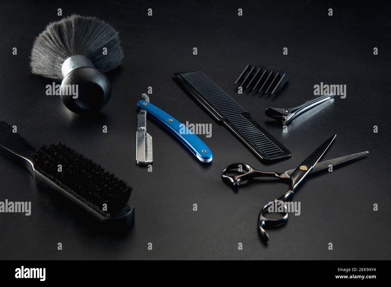 Barber shop equipment set isolated on black table background. Close up ...