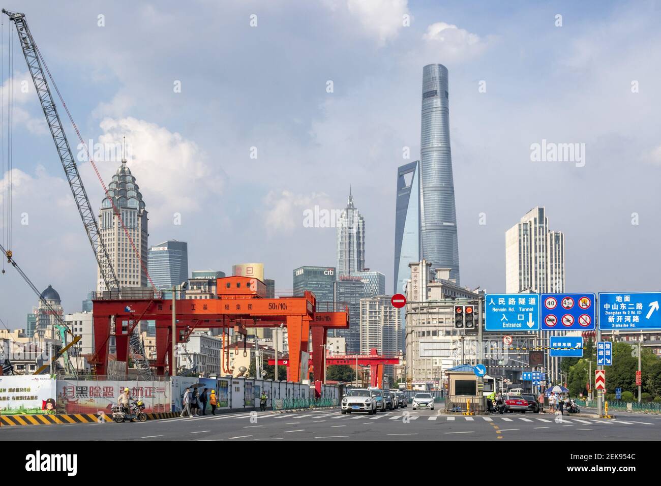 SHANGHAI, CHINA - JULY 12, 2020 - Pedestrians walk through the streets ...
