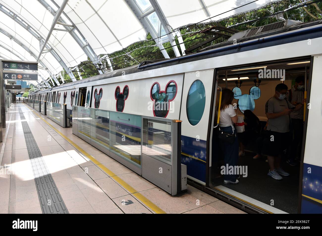 --File--People take a Disney train to the Disneyland Resort in Hong ...