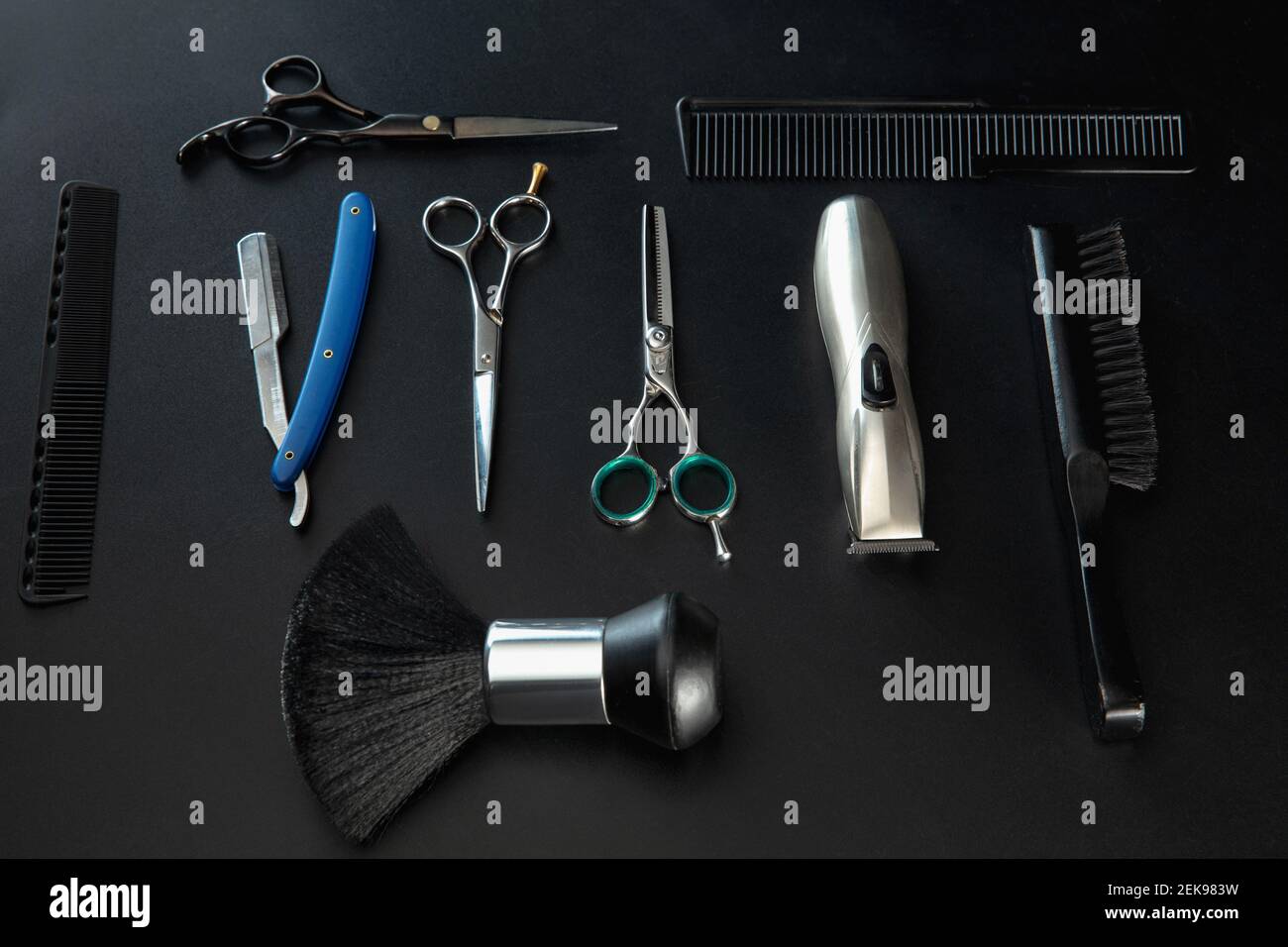 Barber shop equipment set isolated on black table background. Close up ...