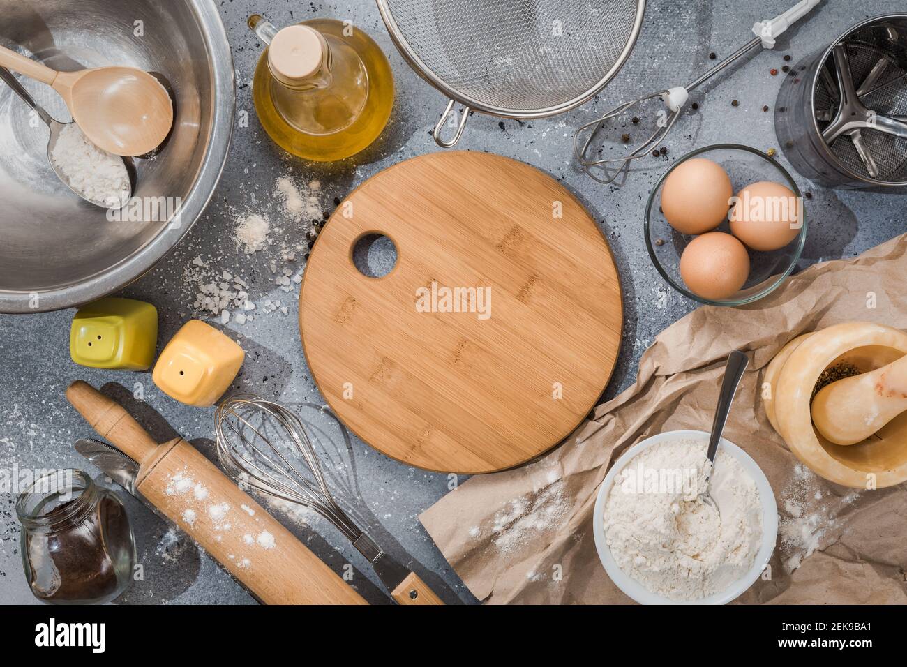 Set of kitchen utensils with products on gray-blue background. Cooking ...