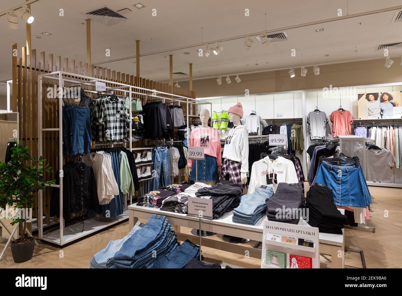 interior of brand new fashion clothes store Stock Photo - Alamy