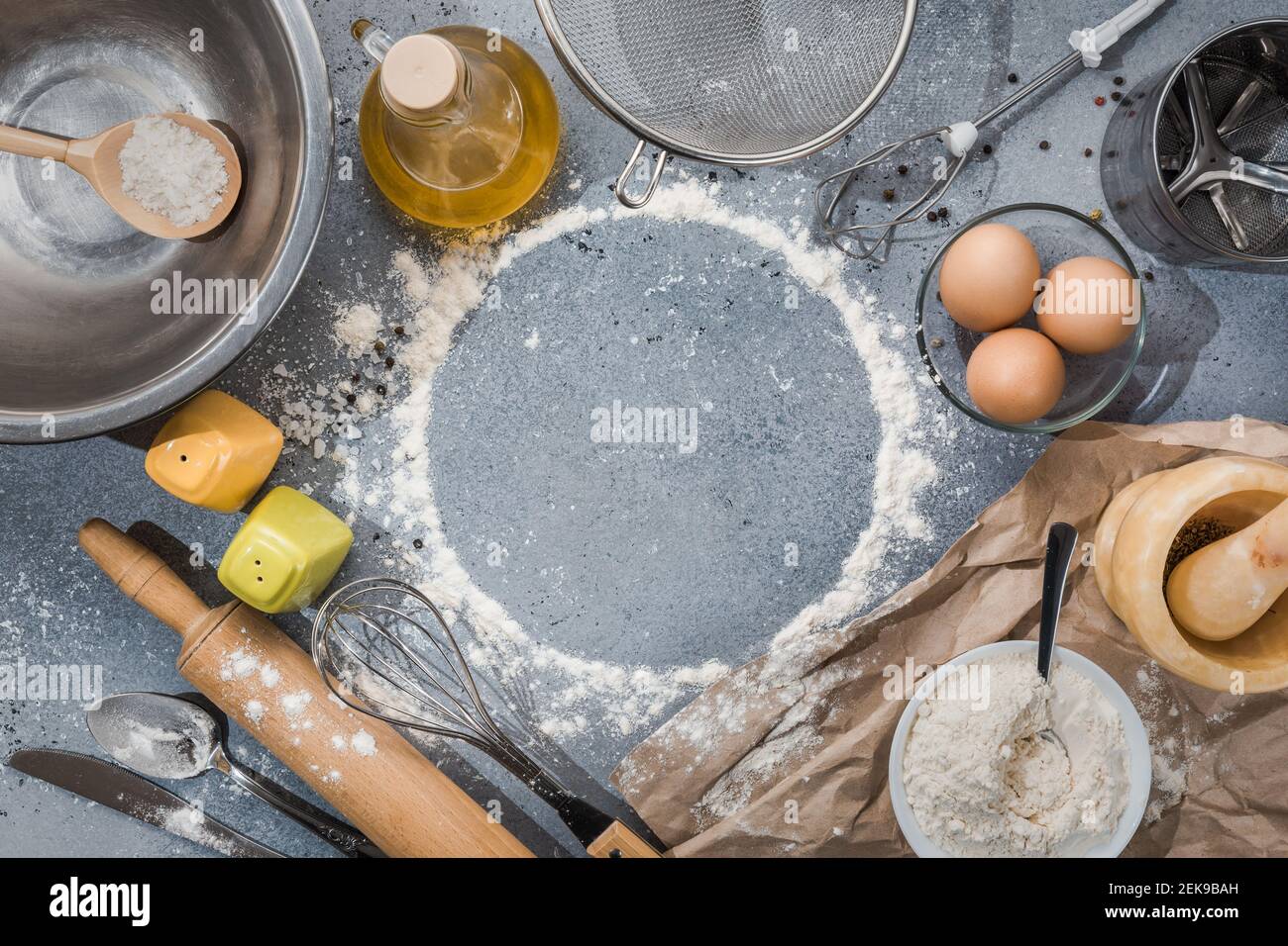 Set of kitchen utensils with products on gray-blue background. Cooking ...