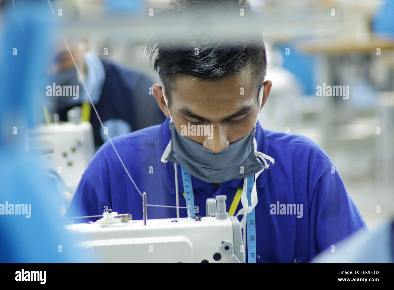 Prisoners are trained in sewing and producing hazmat clothing and masks ...