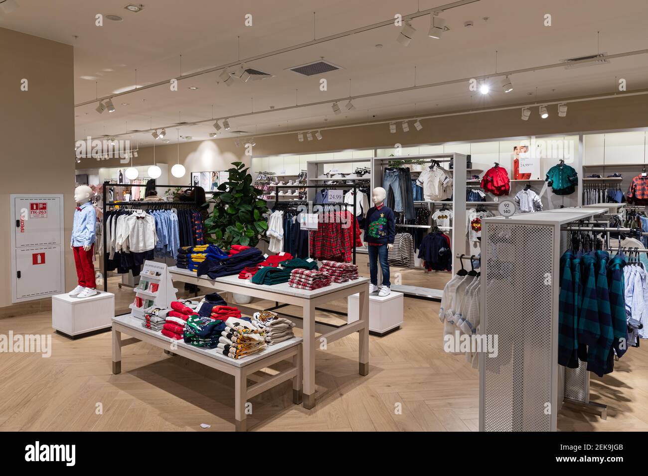 Modern fashionable brand interior of clothing store inside shopping ...