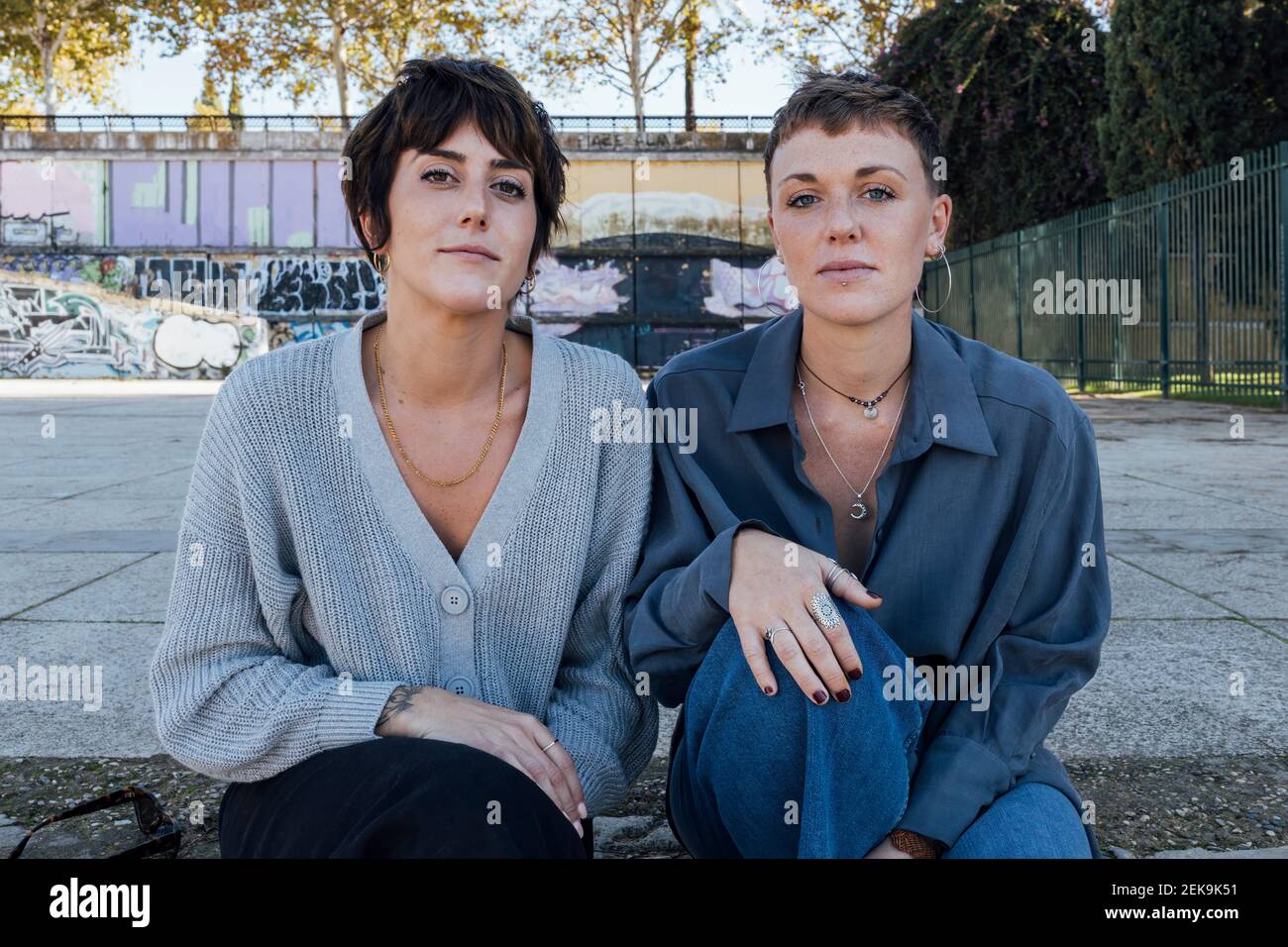 Women are sitting hi-res stock photography and images - Alamy