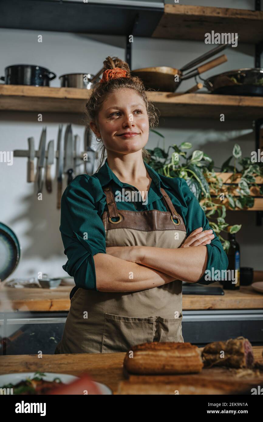 Female chef standing arms hi-res stock photography and images - Alamy