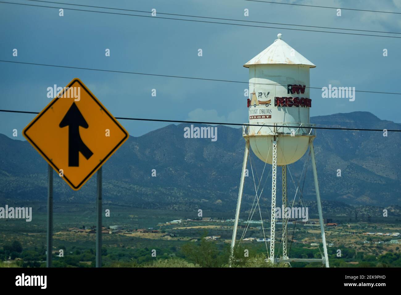 Road sign and watertower along a highway in Western USA Stock Photo - Alamy