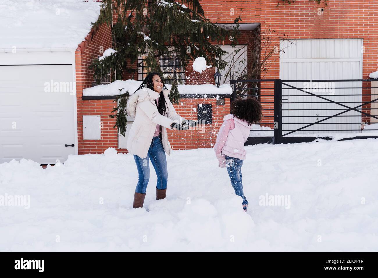Family Playing Outside Winter