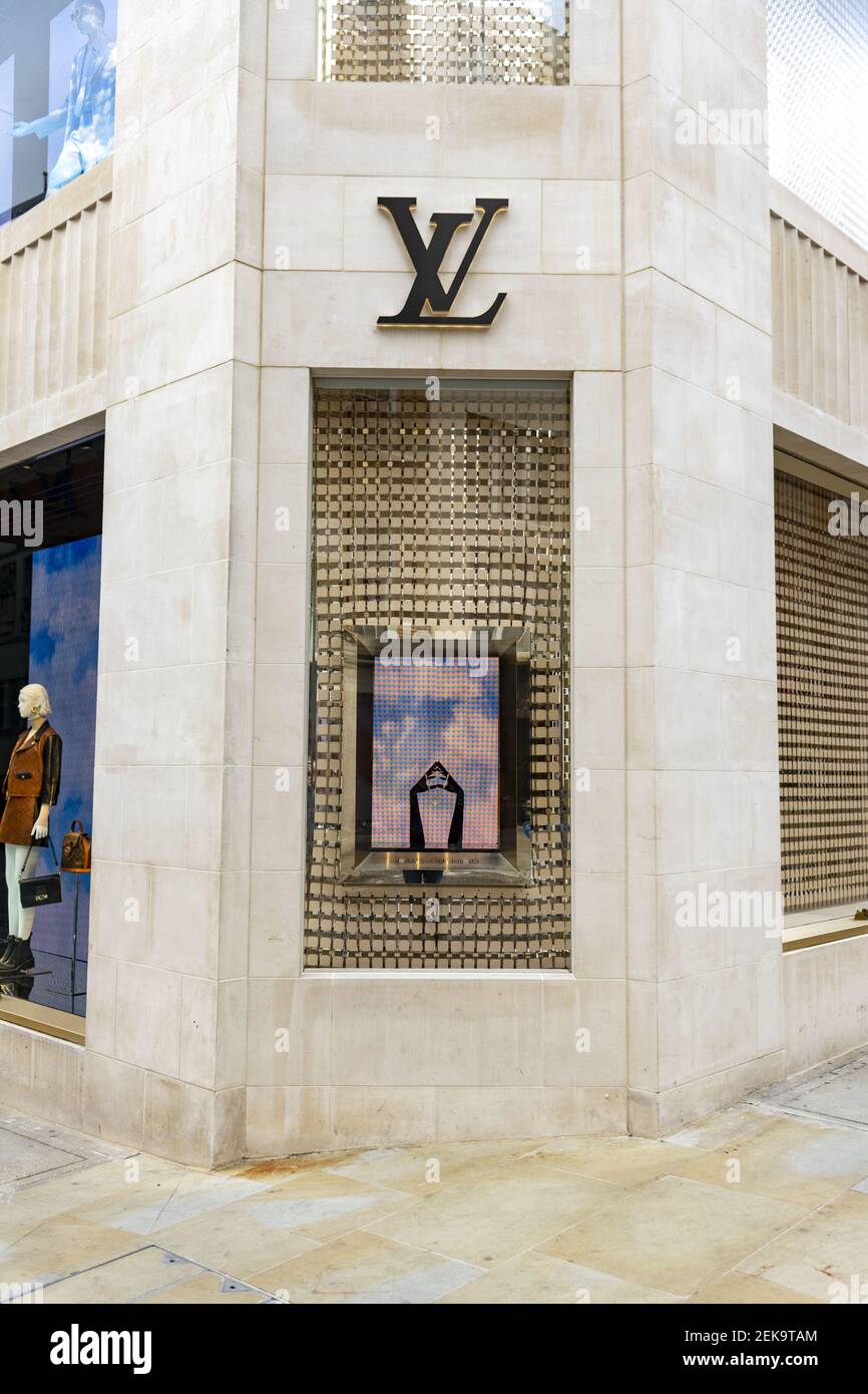 A window with the logo of Louis Vuitton above at their store in the ...