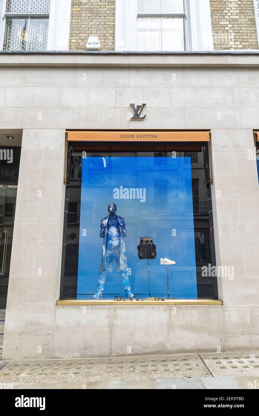 A window with the logo of Louis Vuitton above at their store in the ...