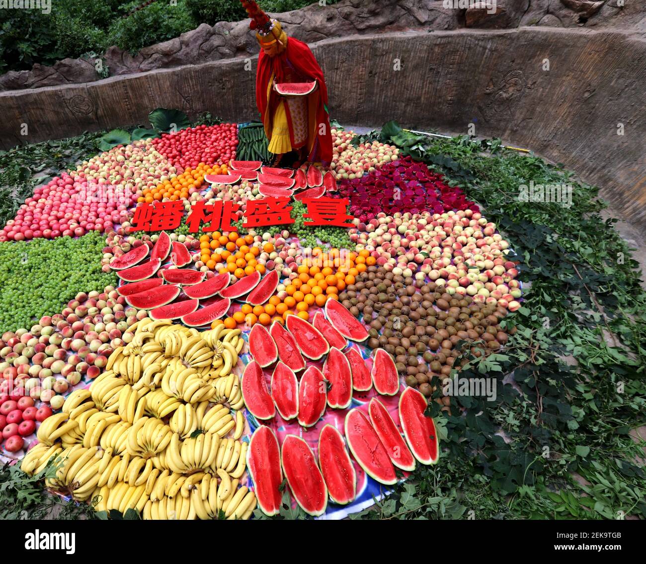 A monkey king is put in the fruit feast pool at the Taihangshan ...