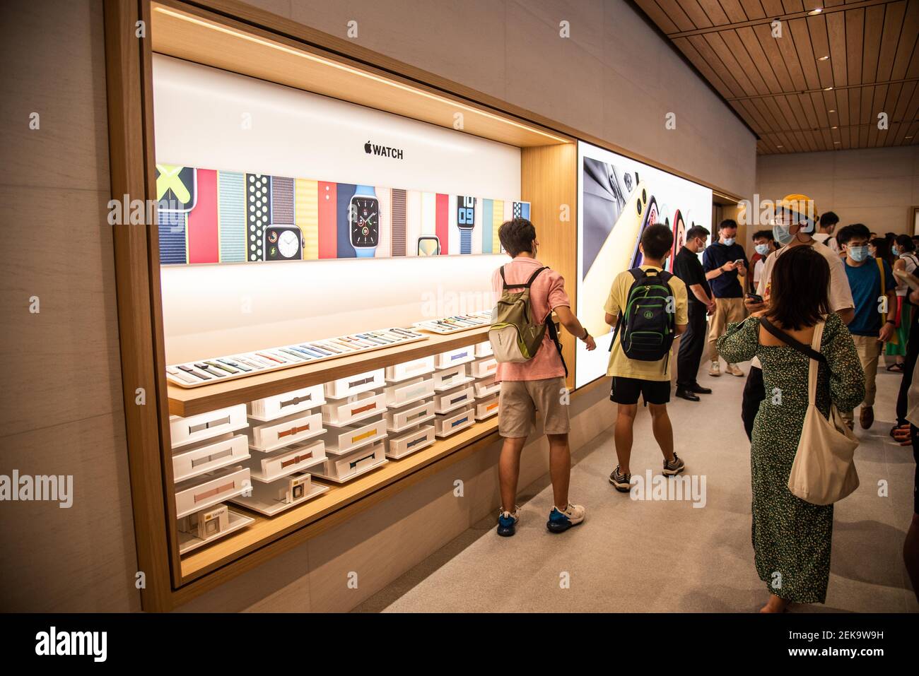 People experience Apple products at the newly-opened Apple Store at ...
