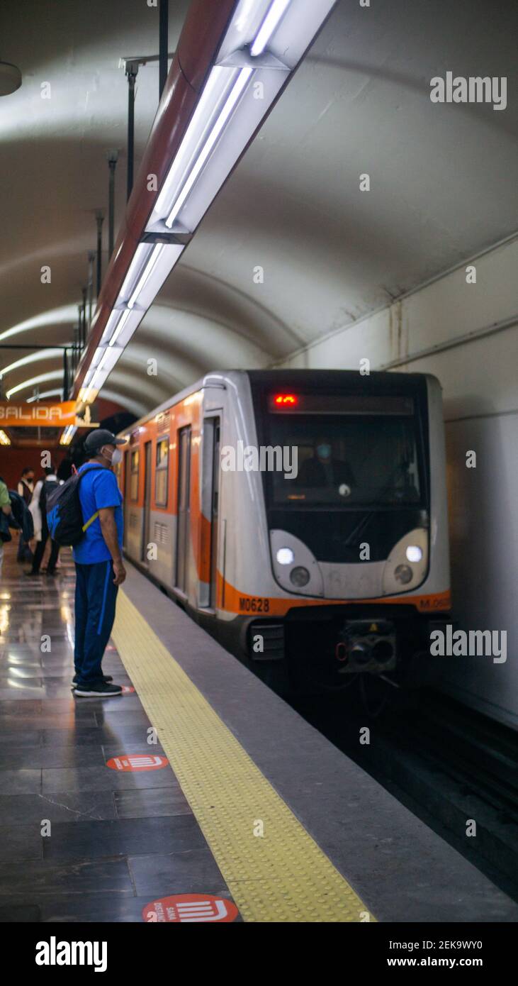 Train arriving at a Mexican City subway station Stock Photo - Alamy