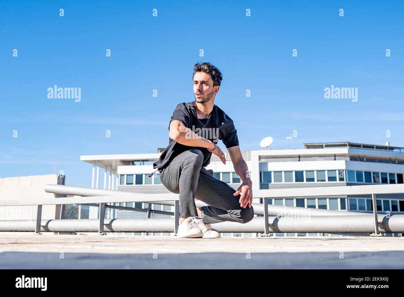 Man resting on roof hi-res stock photography and images - Alamy