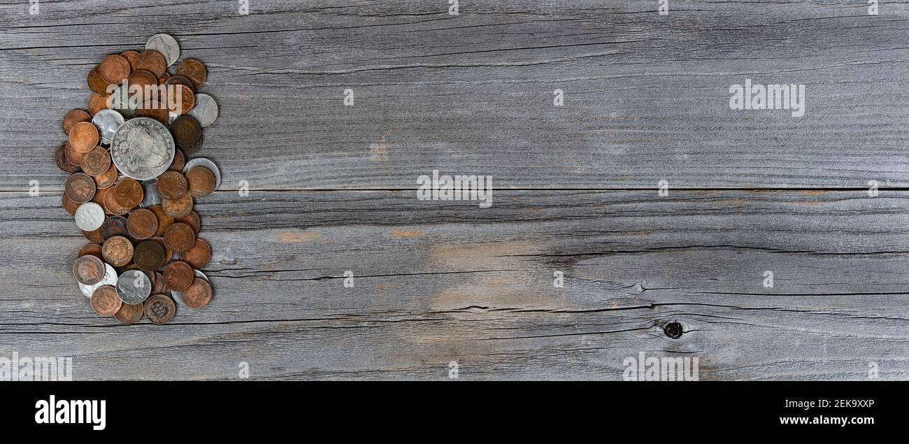 Vintage coins on weathered wooden planks Stock Photo - Alamy