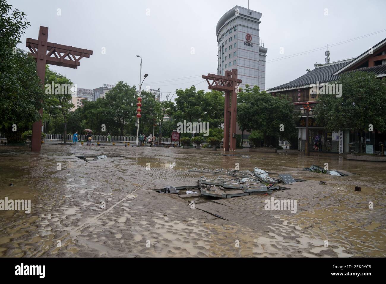 A mess on the street after severe flood recedes in Enshi county-level ...