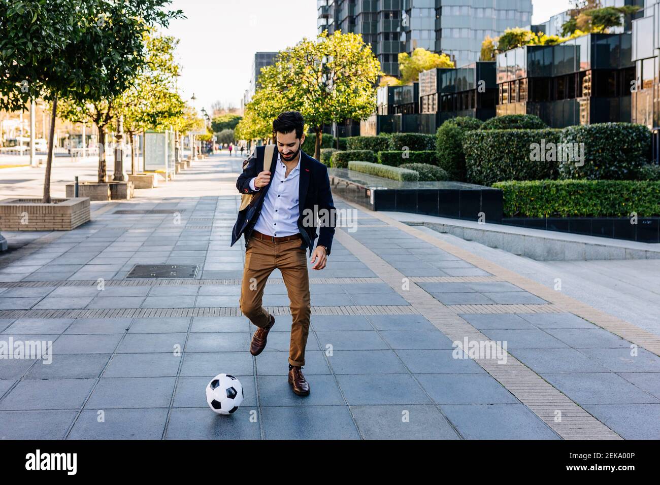 Carrying soccer ball hi-res stock photography and images - Alamy