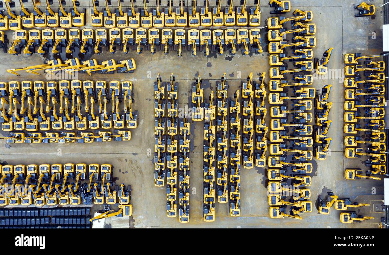 An aerial view of arrays of excavators at a factory of Chinese ...