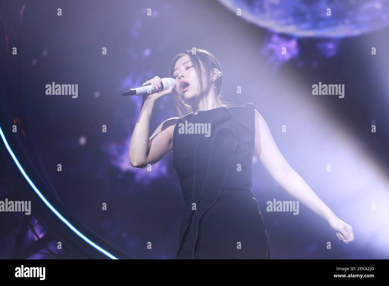 Chinese singer-songwriter Jane Zhang performs at the Chinese Top Ten ...