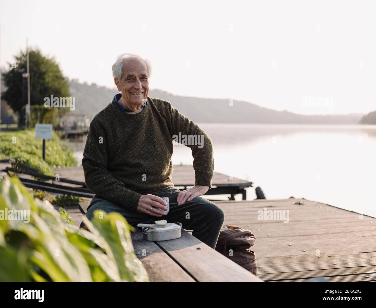 Sitting bench smiling food and drink hi-res stock photography and ...